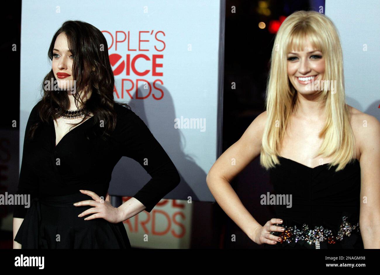 Kat Dennings, left, and Beth Behrs arrive at the People's Choice Awards ...