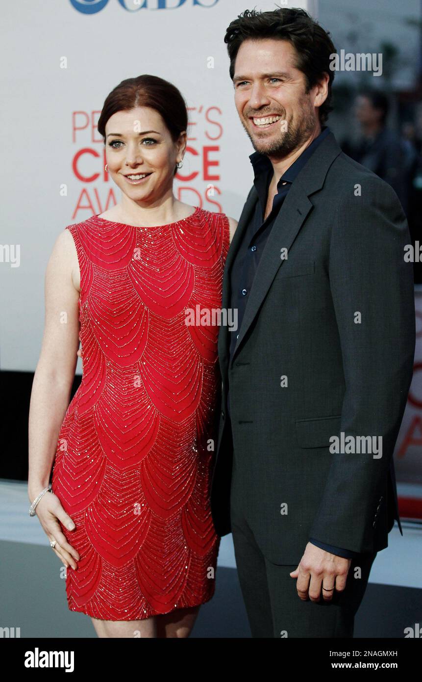 Alyson Hannigan, left, and Alexis Denisof arrive at the People's Choice ...