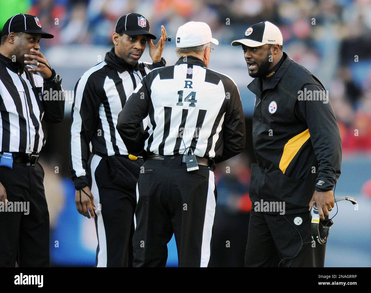 Pittsburgh Steelers head coach Mike Tomlin talks with the referees in ...