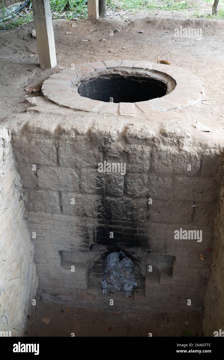 A wood-fired kiln for firing Oaxacan black pottery or barro negro in a ...