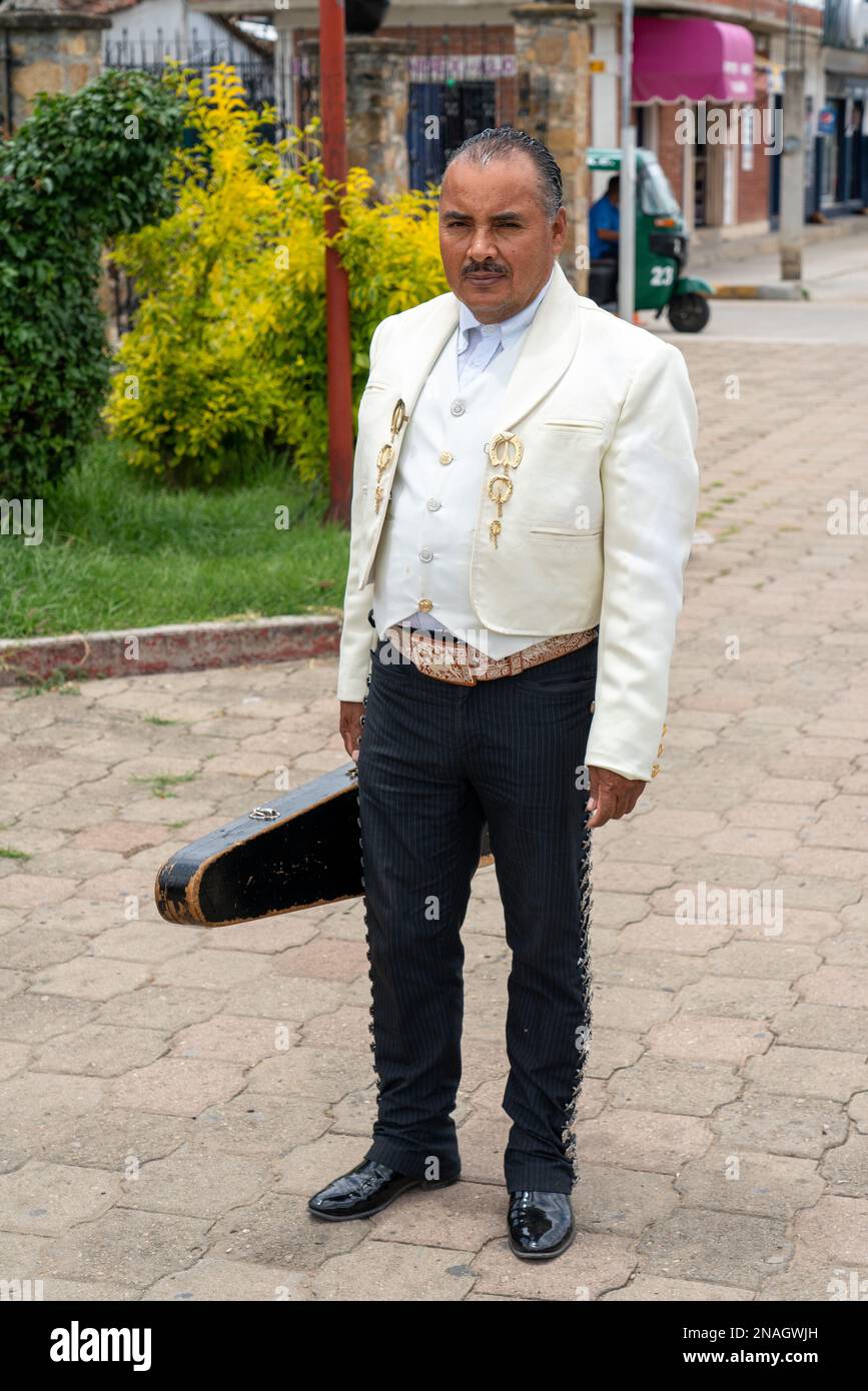 A Mariachi musician in charro costume in the pueblo of San Bartolo ...