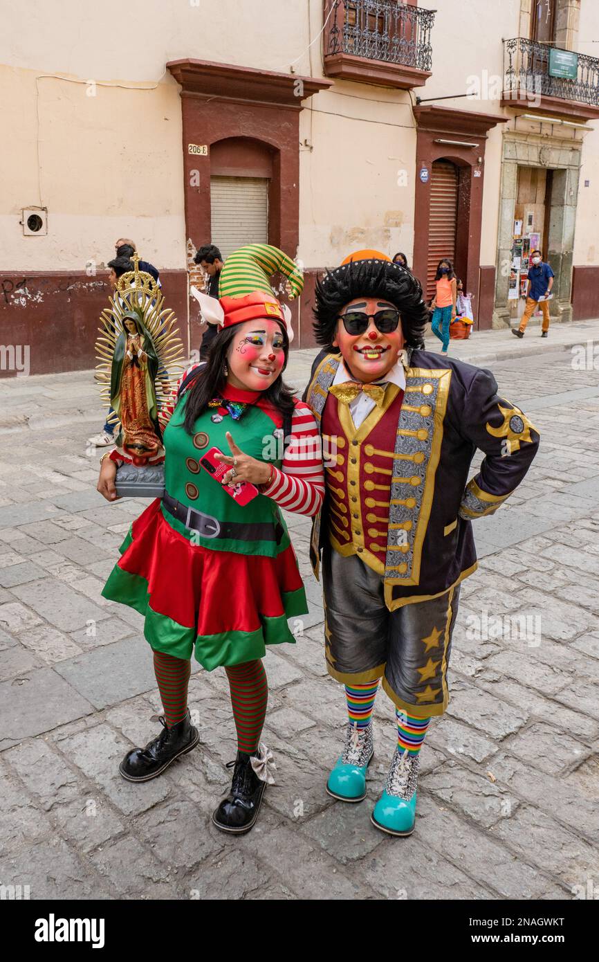 A parade of clowns on the Macedonio Alcala pedestrrian street in the ...