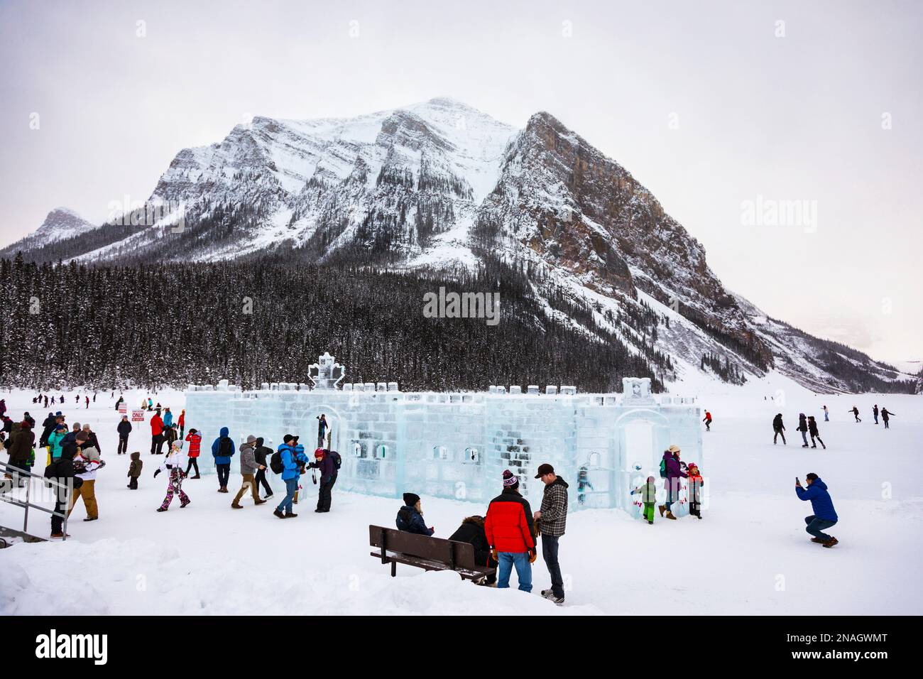 Visitors at Lake Louise skating and looking at the ice castles with ...