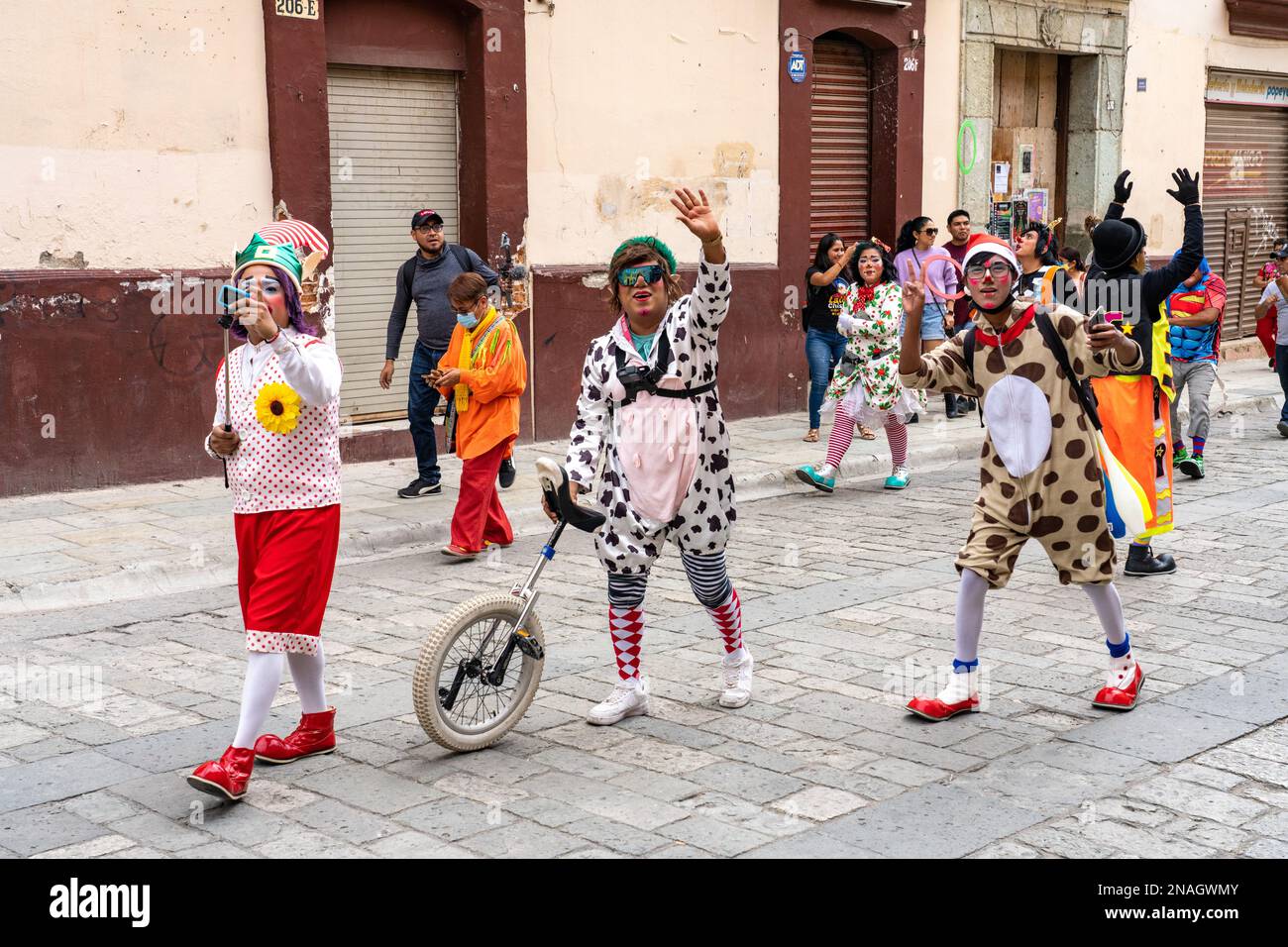 A parade of clowns on the Macedonio Alcala pedestrrian street in the ...