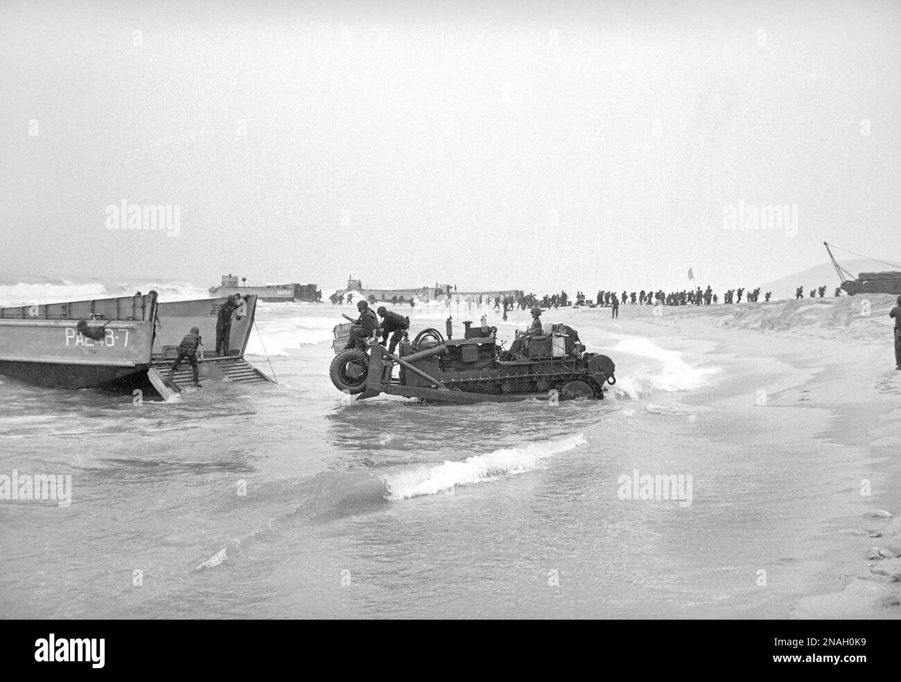 Troops landing on the beach during the Vietnam War. Location and date ...