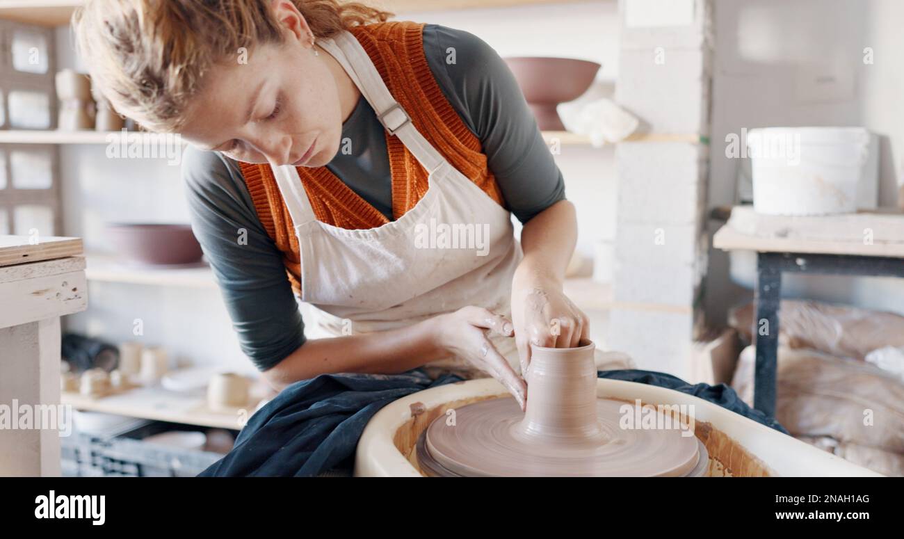Pottery wheel, woman and sculpture in artist studio, workshop and small ...