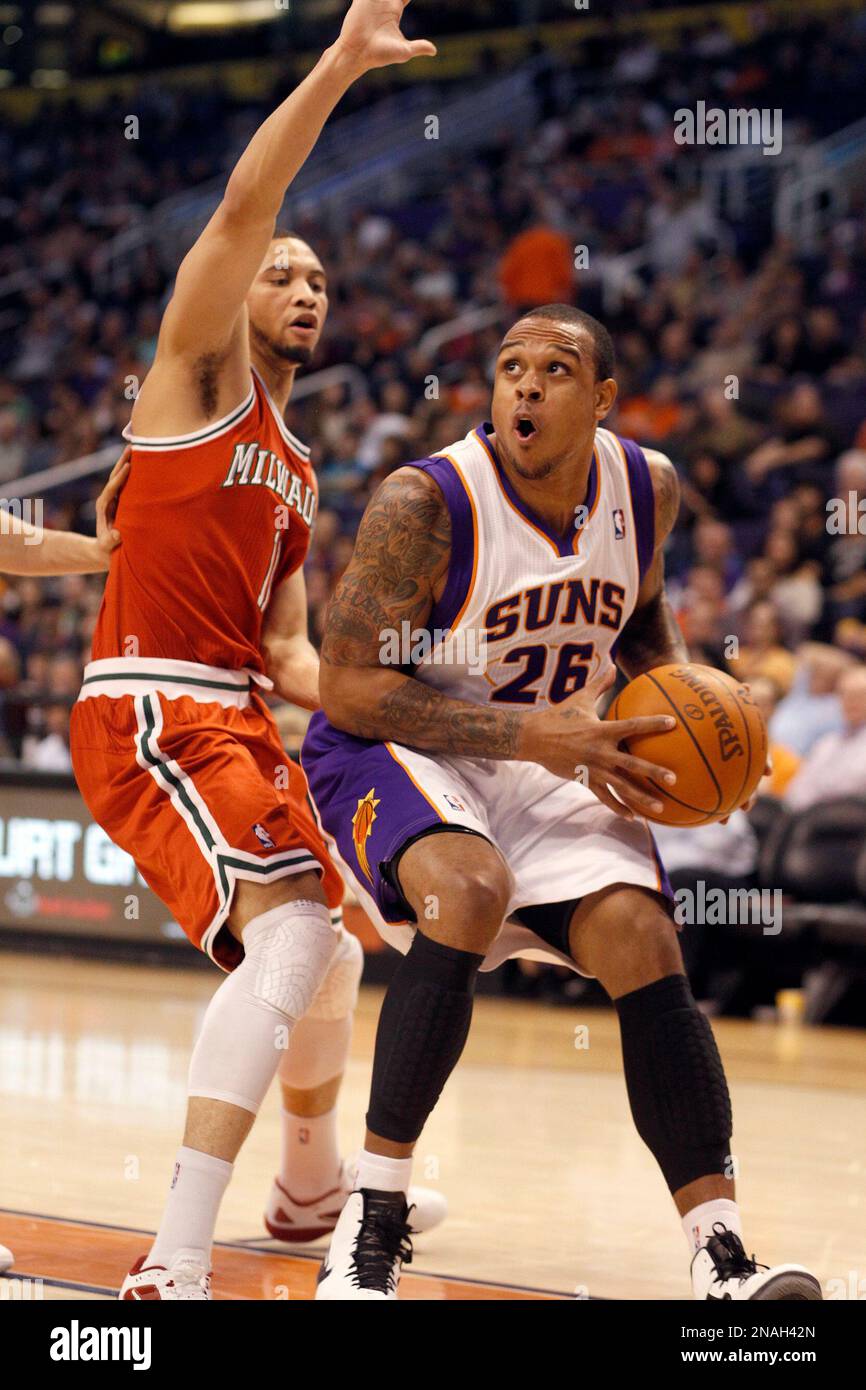 Phoenix Suns' Shannon Brown, right, against Milwaukee Bucks' Darington ...
