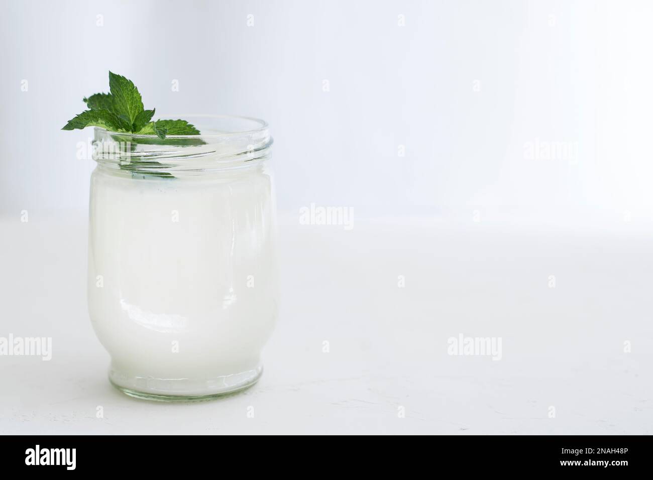 Organic probiotic milk kefir drink or yogurt in glass containers,on the ...