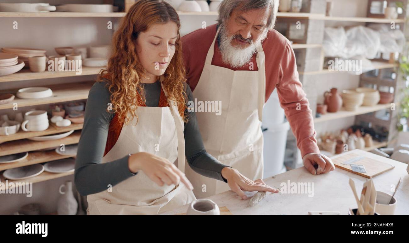 Art teacher, pottery and senior man in a class, learning tips in art ...