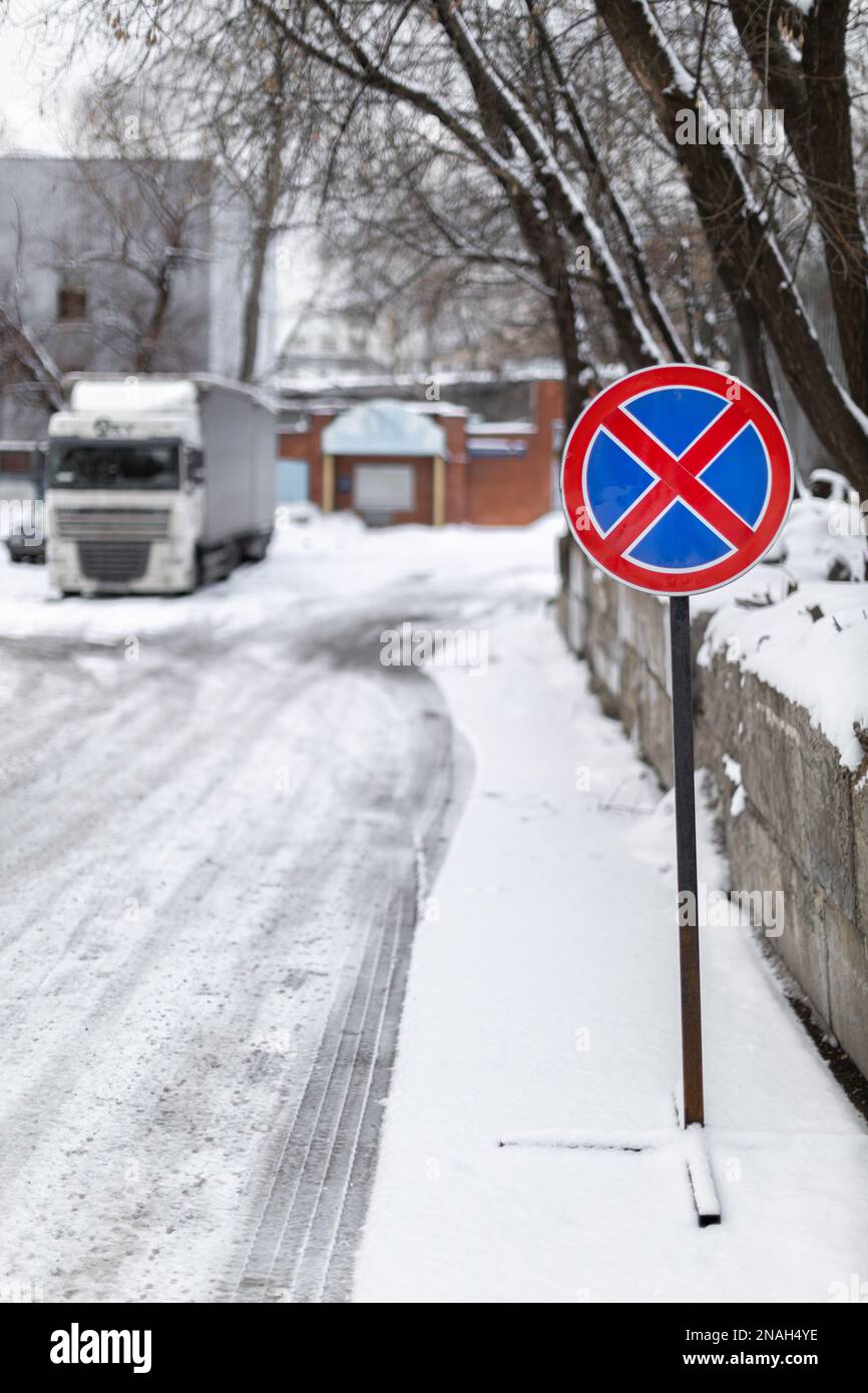 road sign prohibiting stopping on this side of the street. no stop sign ...