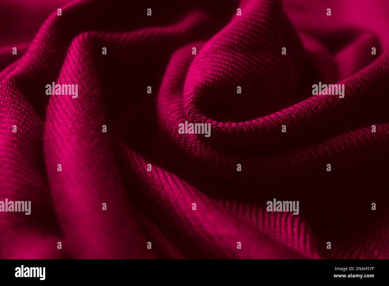 Fabric texture background of magenta color (Viva Magenta). Close up of ...