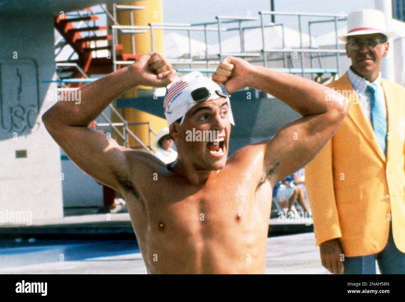 American swimmer George DiCarlo celebrates after setting an Olympic ...