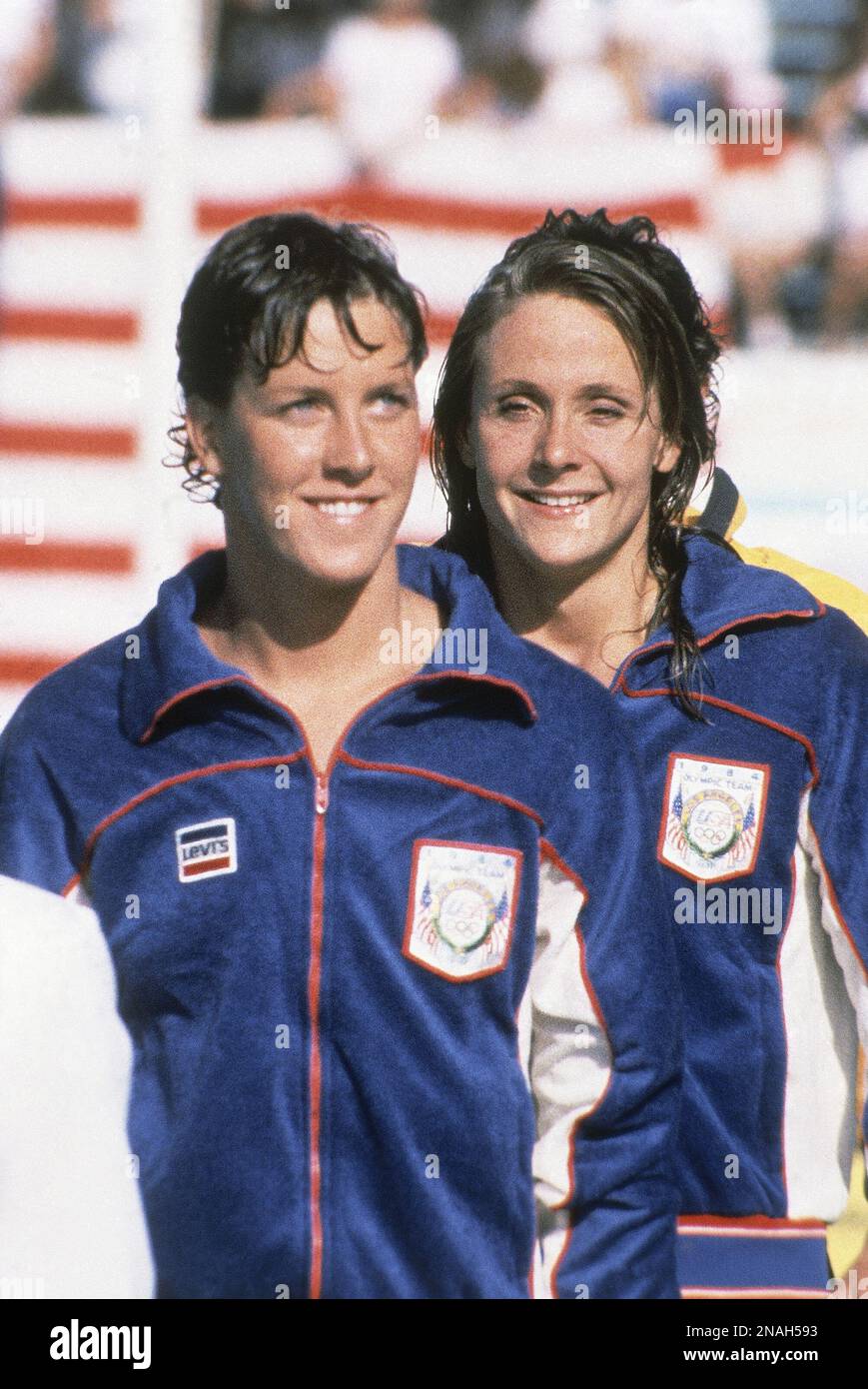Gold medal winner, American swimmer Tracy Calkins, left; and compatriot ...