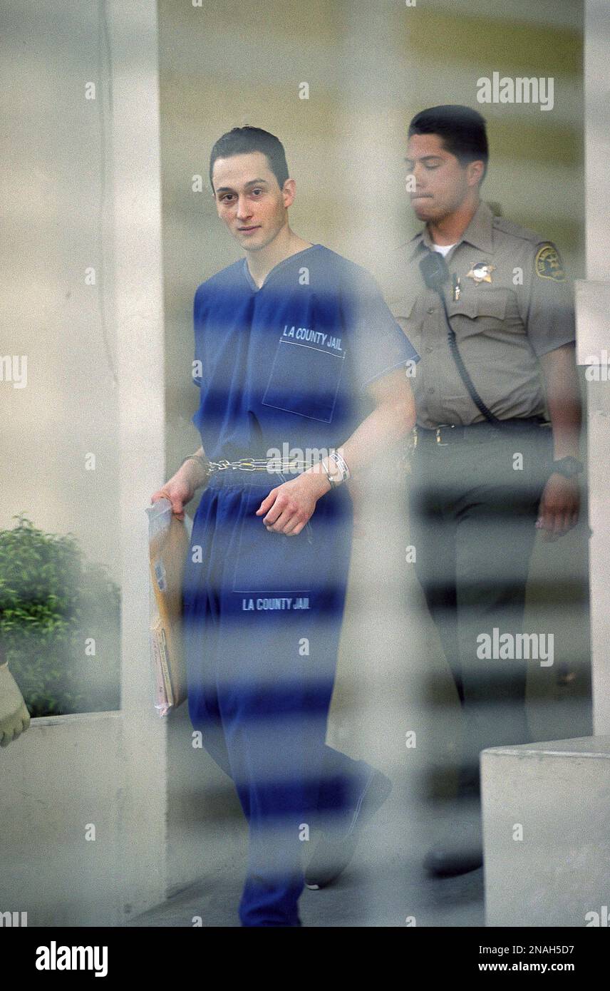 Mikail Markhasev, wearing handcuffs and chains, leaves the Santa Monica ...