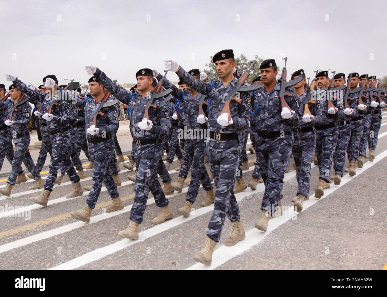 Iraqi federal police march during a ceremony marking Police Day in ...