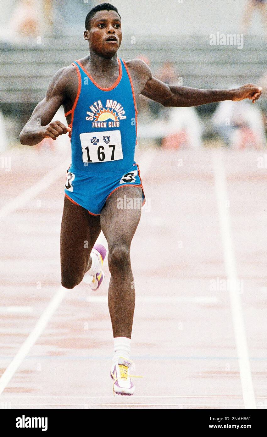 American sprinter Carl Lewis wins his heat in the 200 Meter Race at the ...