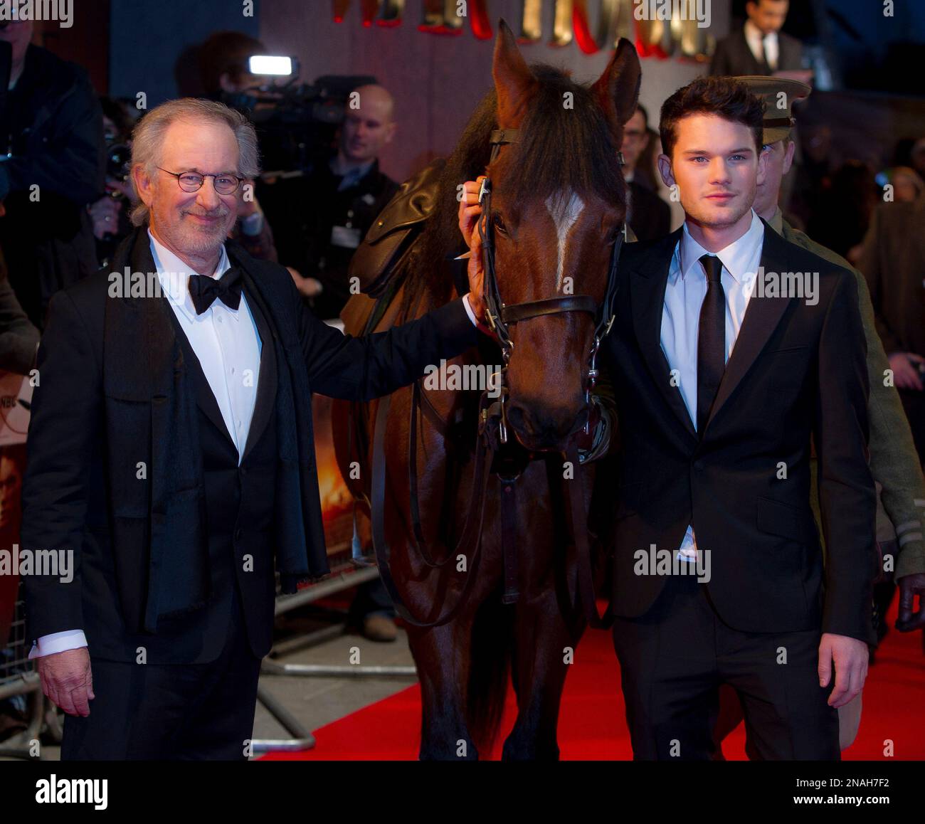 Director Steven Spielberg, left and actor Jeremy Irvine, stand with ...