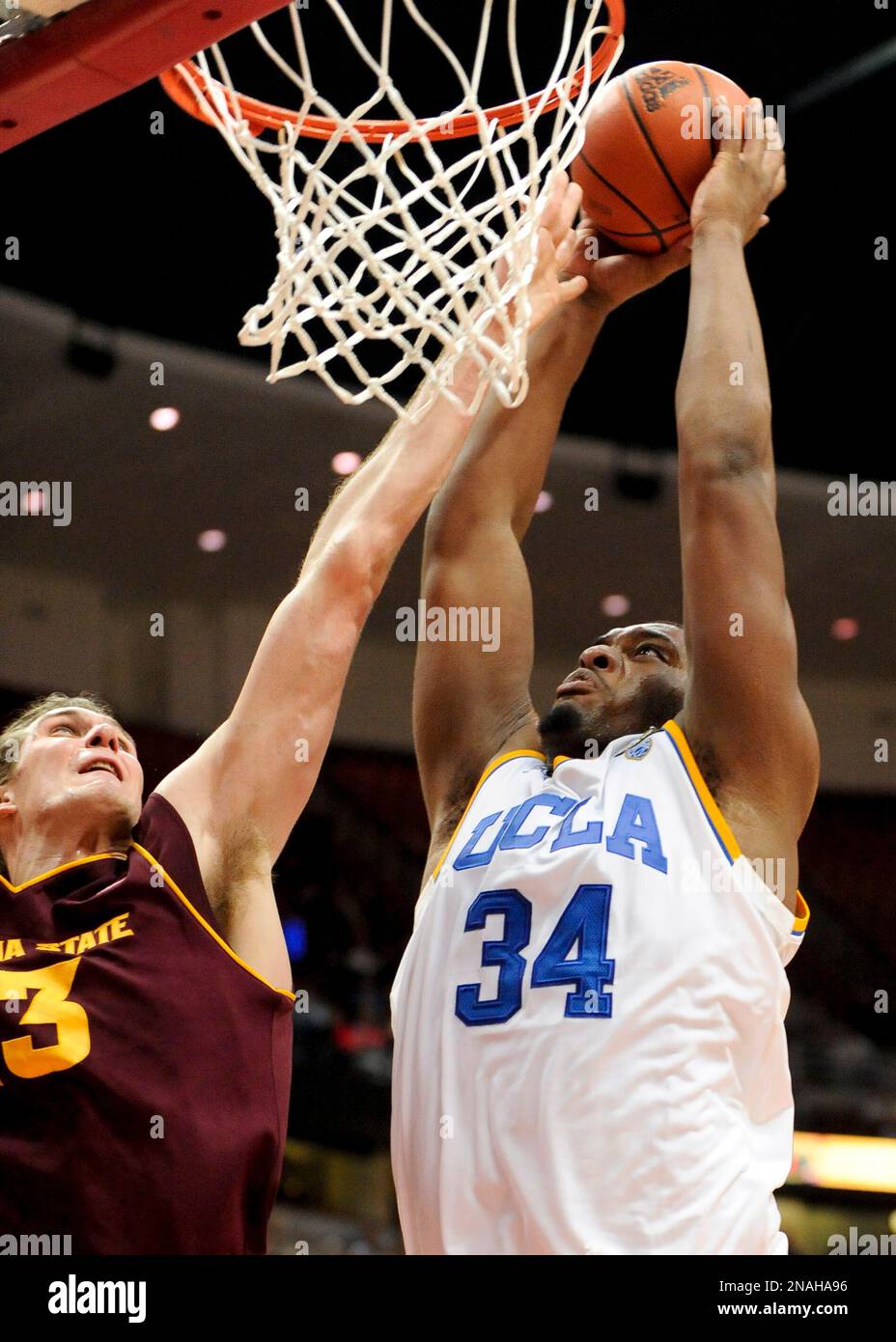 UCLA center Joshua Smith (34) dunks on Arizona State center Jordan ...