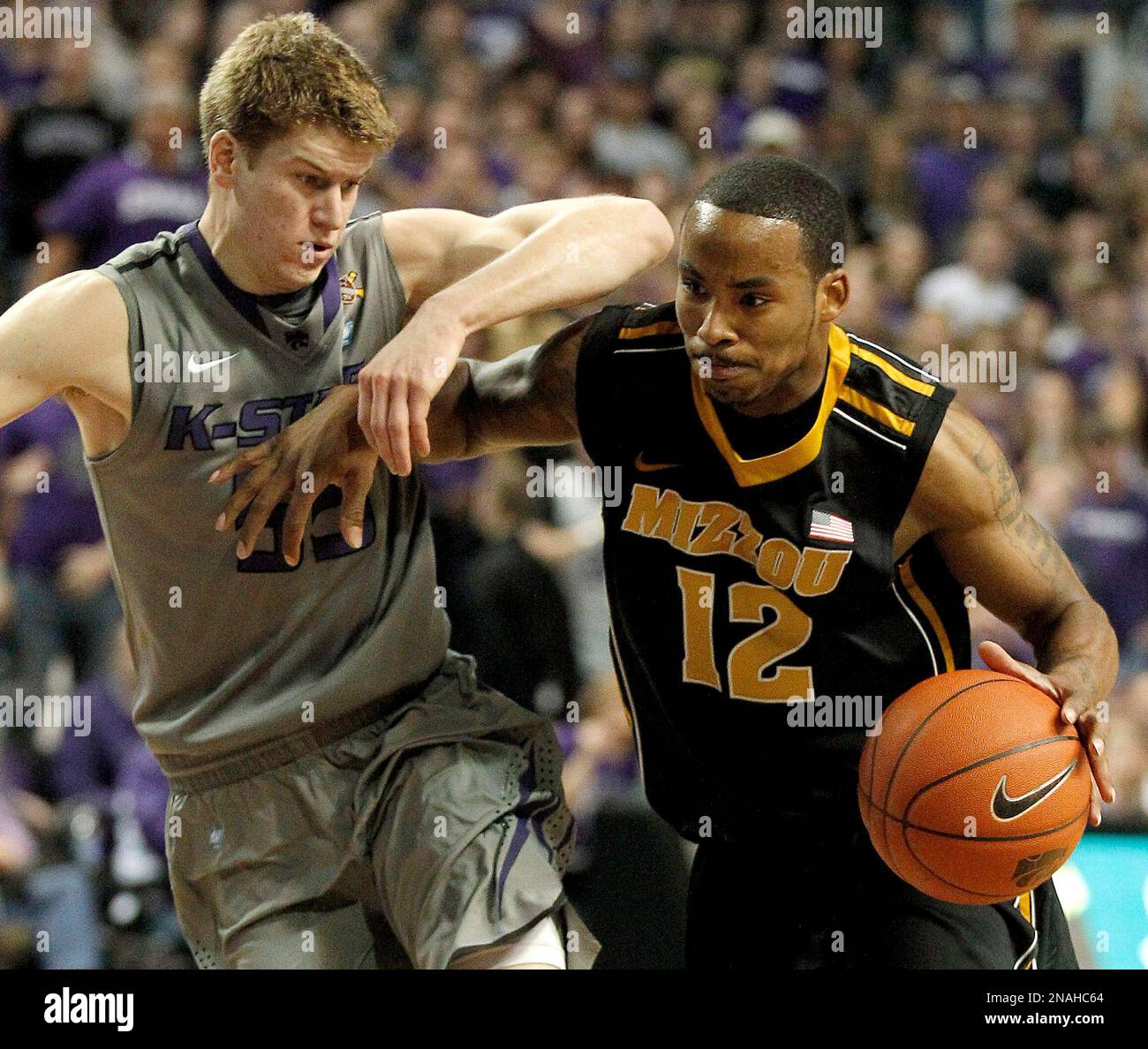 Kansas State guard Will Spradling (55) tries to steal the ball from ...