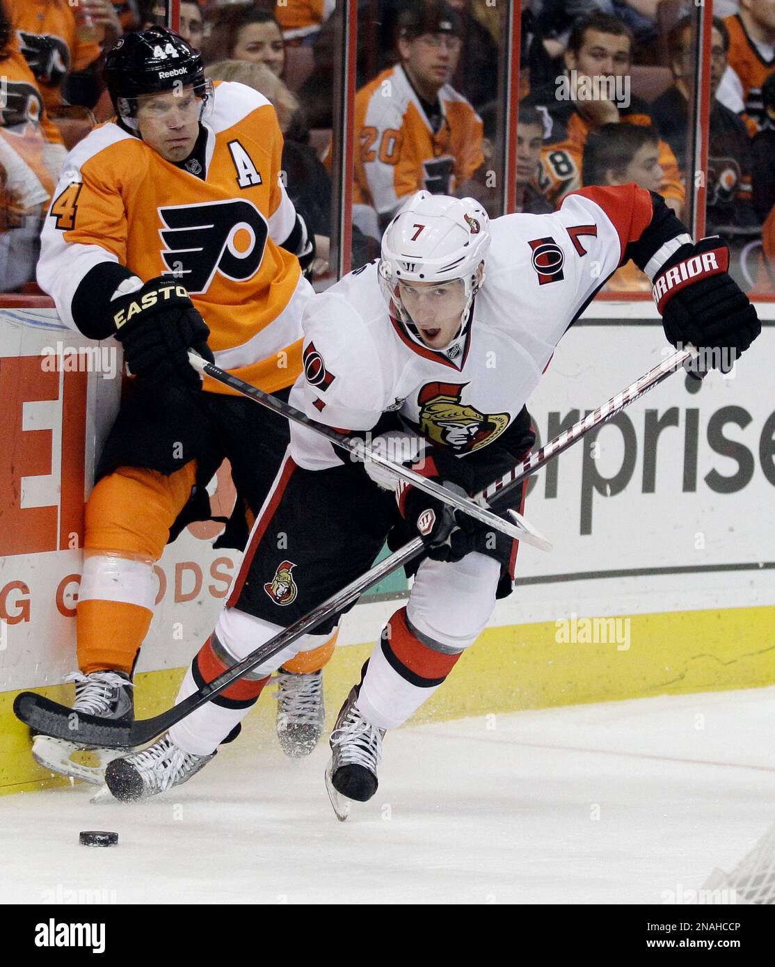Philadelphia Flyers' Kimmo Timonen, left, of Finland, and Ottawa ...