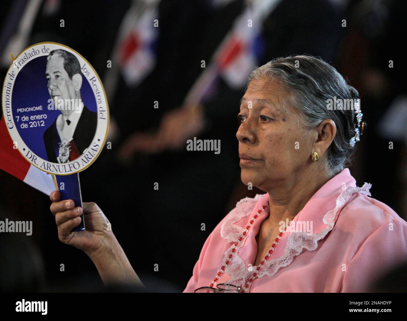 A woman attends a mass honoring late Panama's three-time President ...