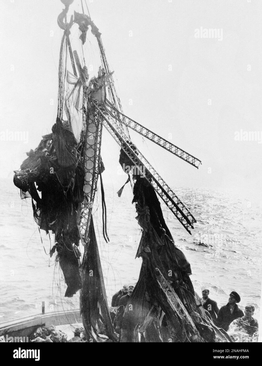 Wreckage of the USS Akron, ill-fated naval dirigible, is hauled from ...
