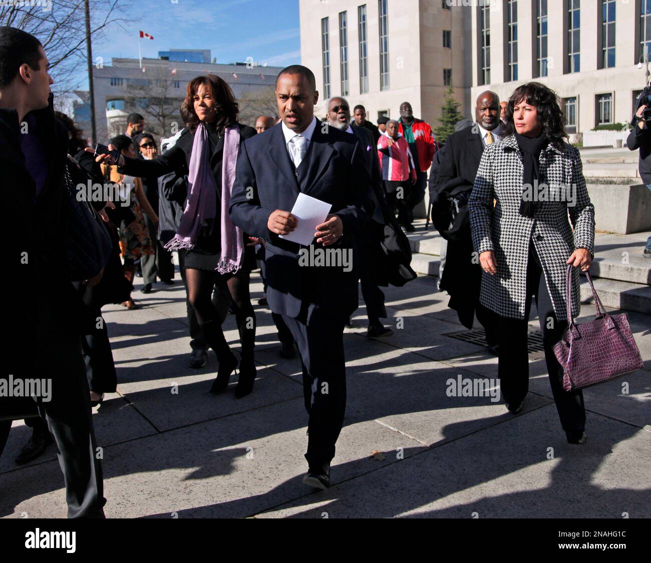 Former Washington DC Council member Harry Thomas Jr., left, with his ...