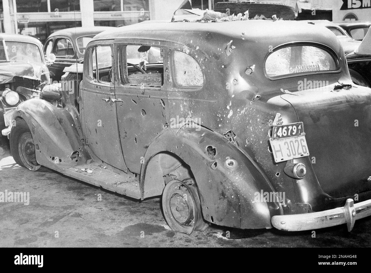 A Japanese bomb hit this car in the raid on Honolulu and nearby Pearl ...