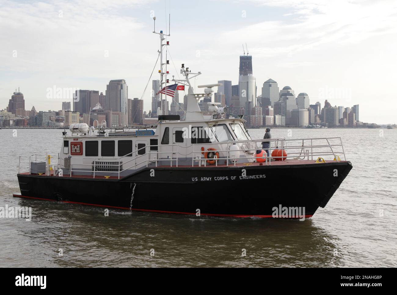 A U.S. Army Corps of Engineers boat is shown against the lower ...