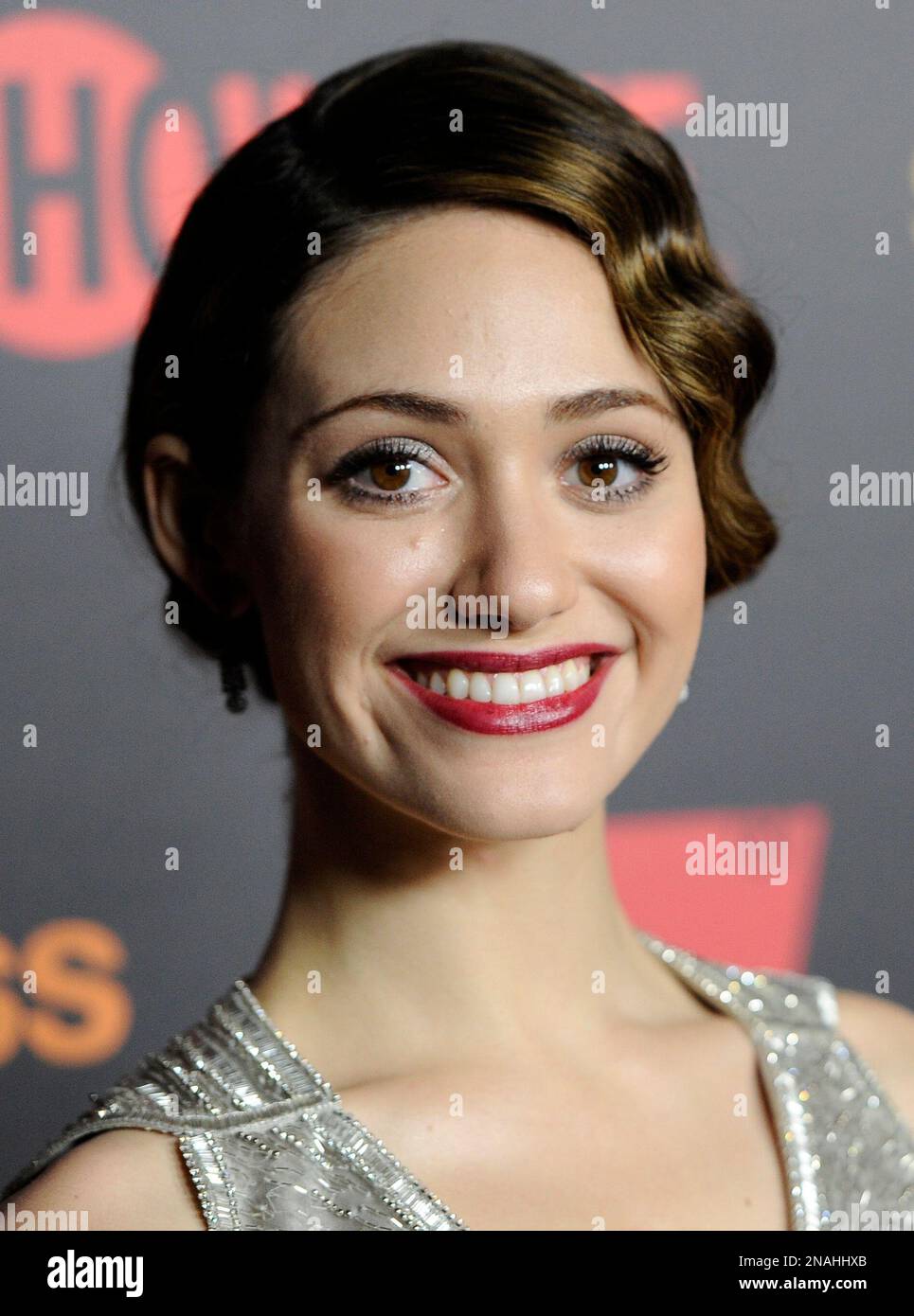 Emmy Rossum, a cast member in "Shameless," poses at the premiere of the ...