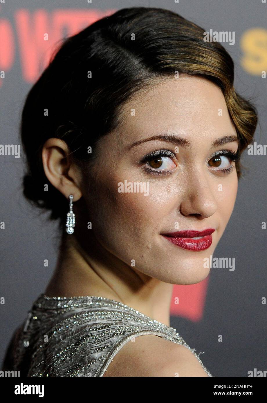 Emmy Rossum, a cast member in "Shameless," poses at the premiere of the ...