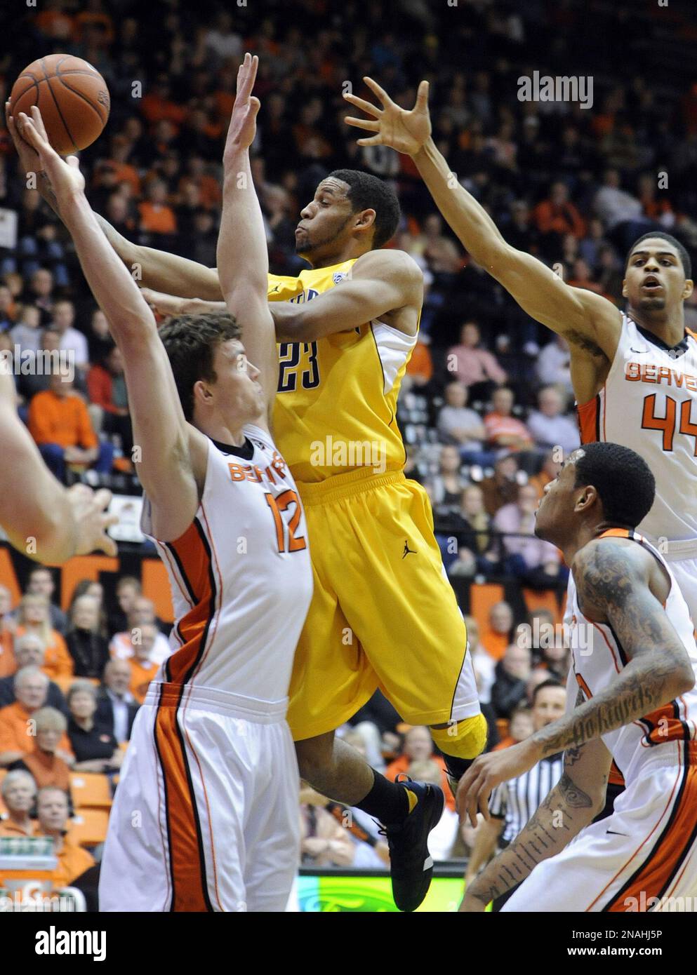 California's Allen Crabbe (23) shoots against Oregon State's Angus ...