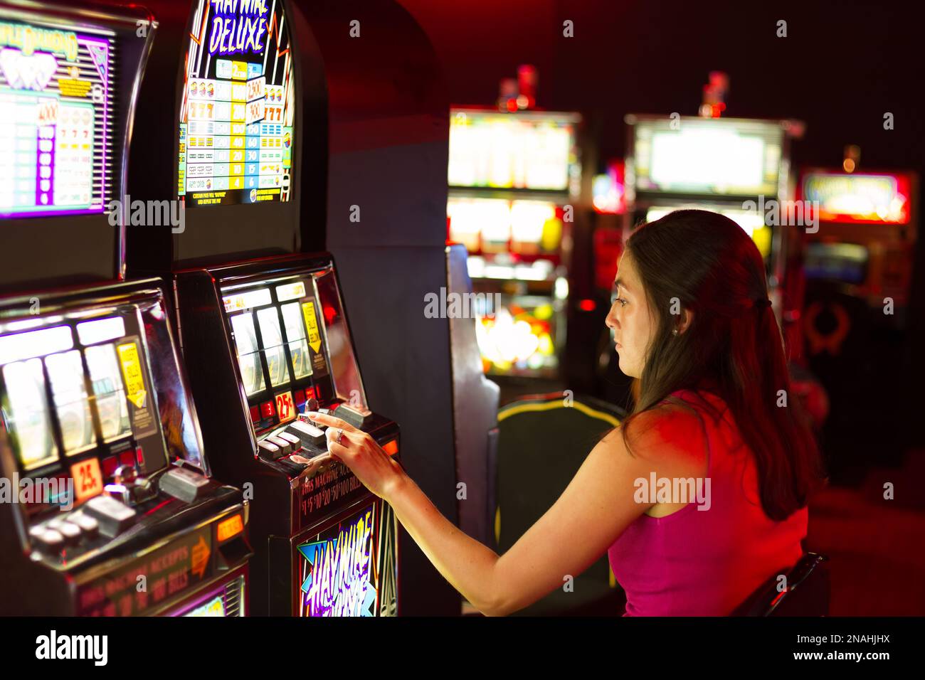 Sitting at betting machine hi-res stock photography and images - Alamy