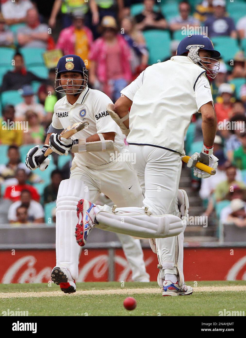 India's batsman Sachin Tendulkar left, and VVS Laxman run between the ...