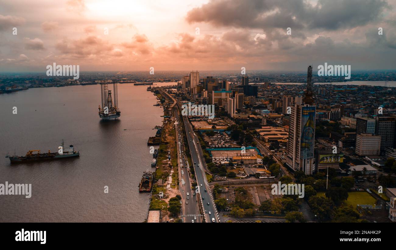 An aerial view of Lagos waterside buildings and roads at sunset Stock ...