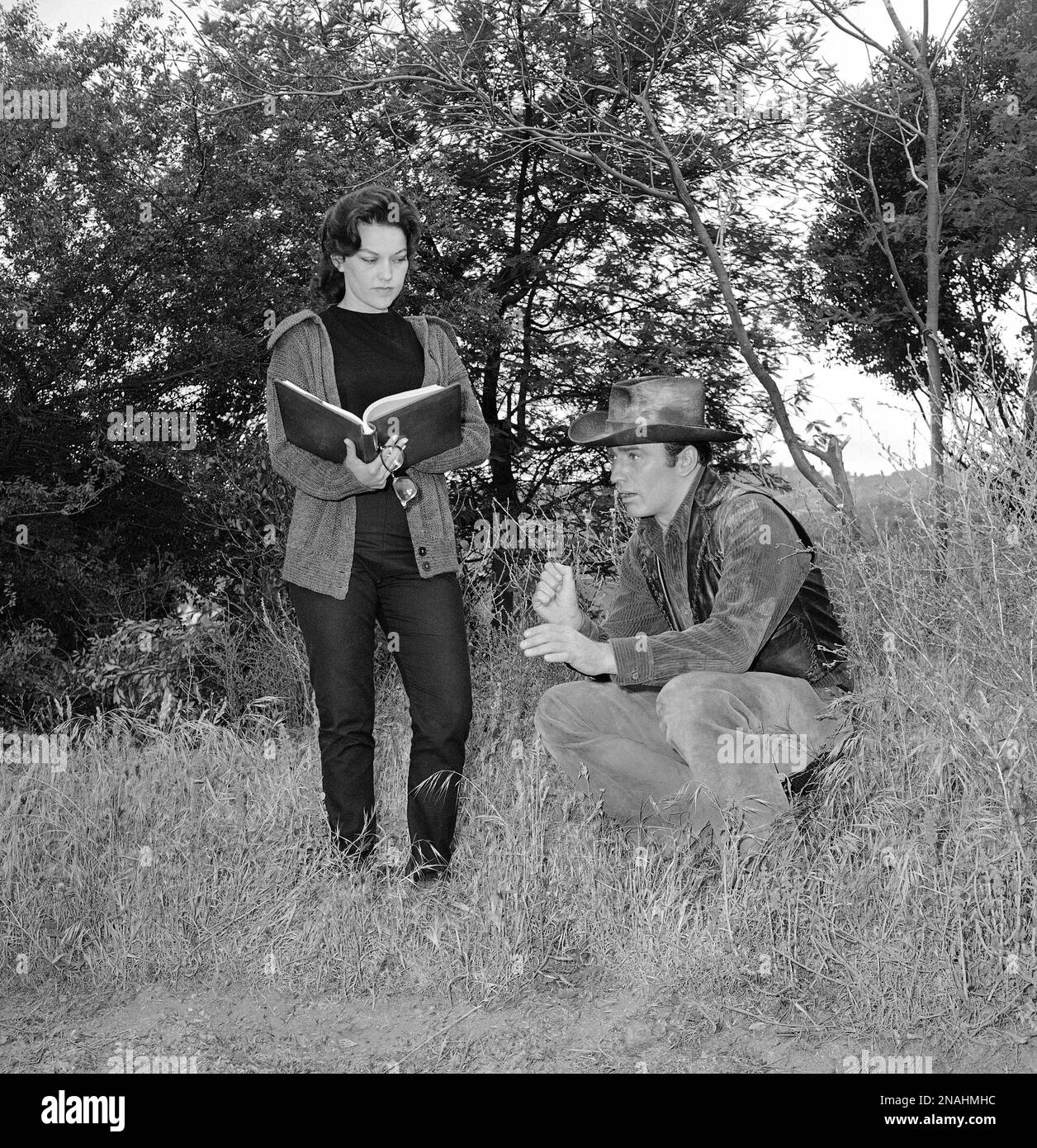 Actor James Drury gets an assist from his friend Phillis Mitchell, who ...