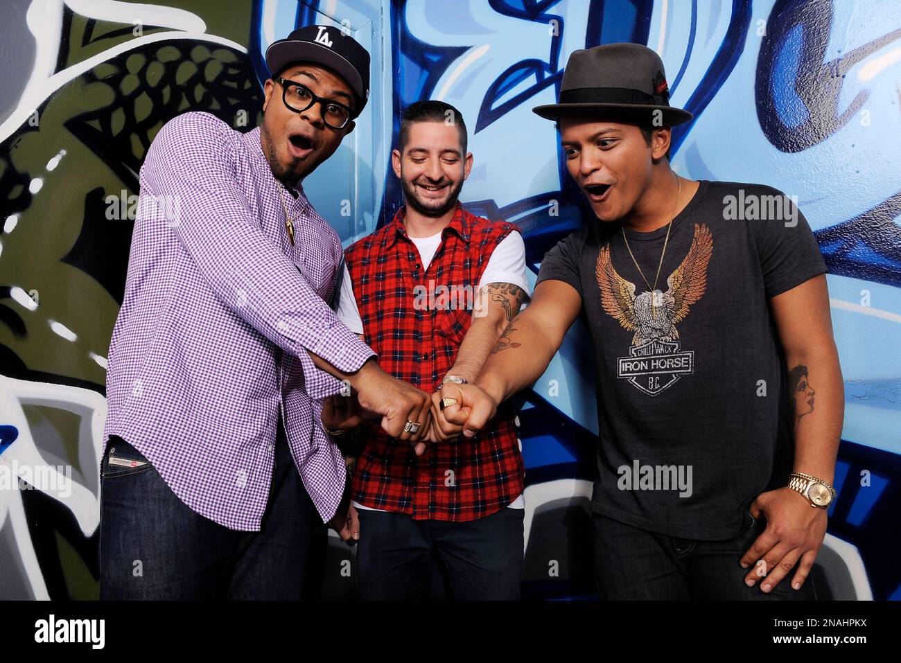 Philip Lawrence, left, Ari Levine, center, and Bruno Mars of the ...