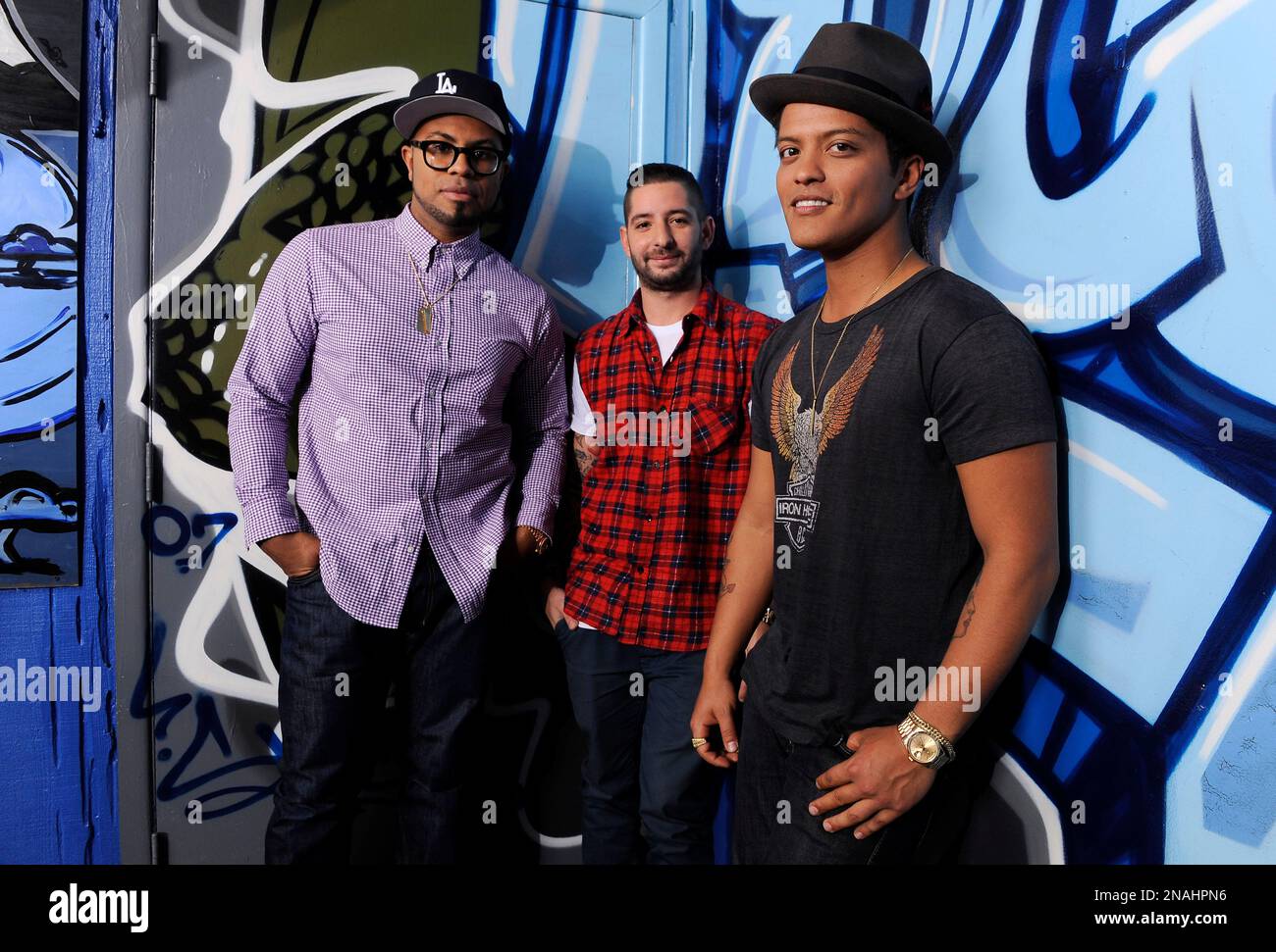 Philip Lawrence, left, Ari Levine, center, and Bruno Mars of the ...