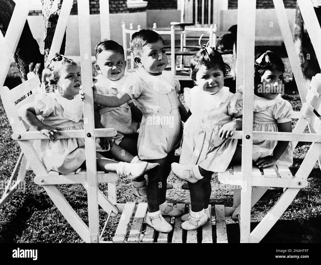 The Diligenti quintuplets, who will be two years old in July, sun ...