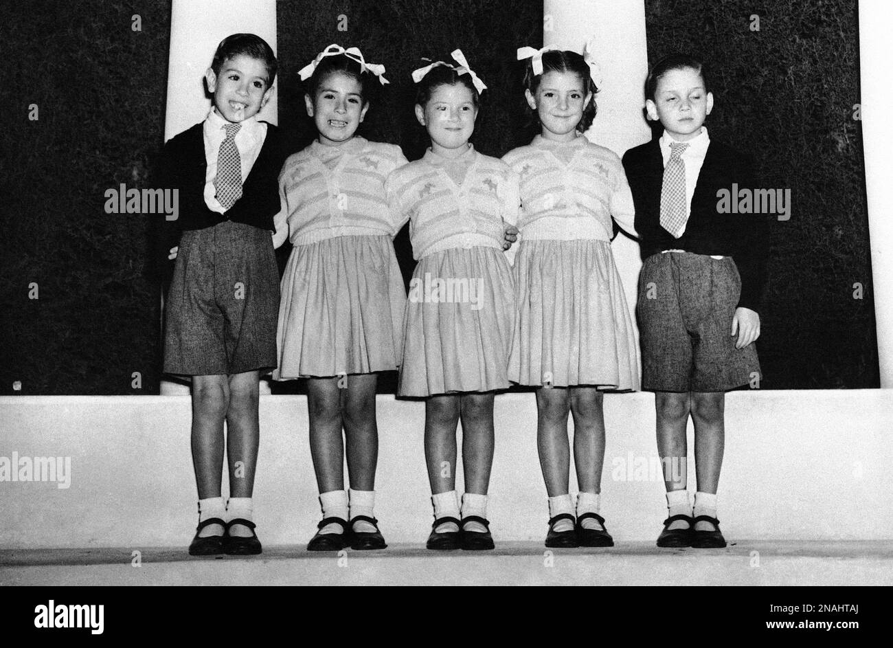 The Diligenti quintuplet children, as they line up to pose for pre ...