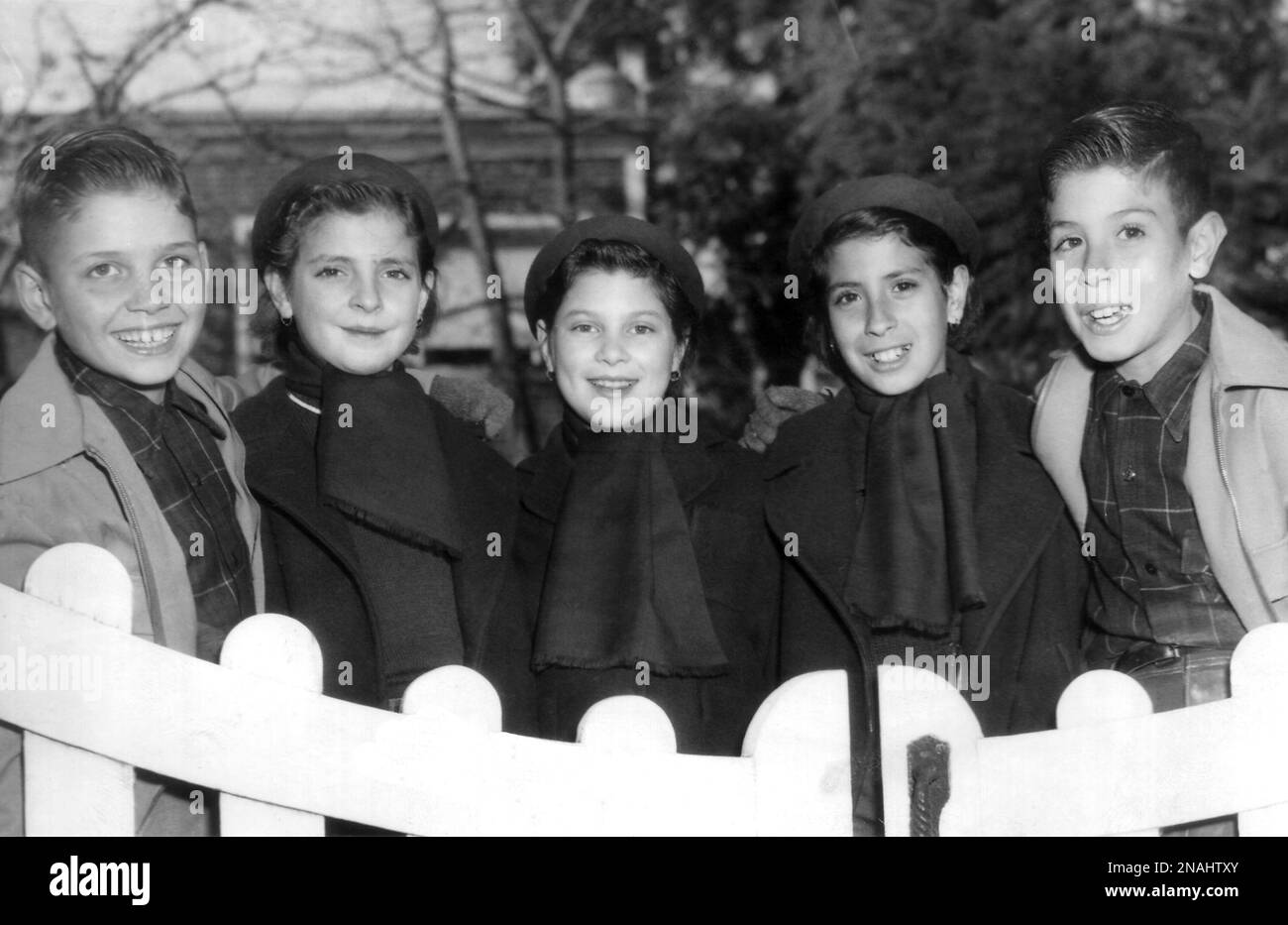 The Diligenti quintuplets in heavy winter clothing in Buenos Aires on ...