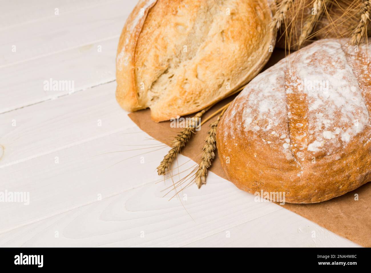 Homemade natural breads. Different kinds of fresh bread as background ...