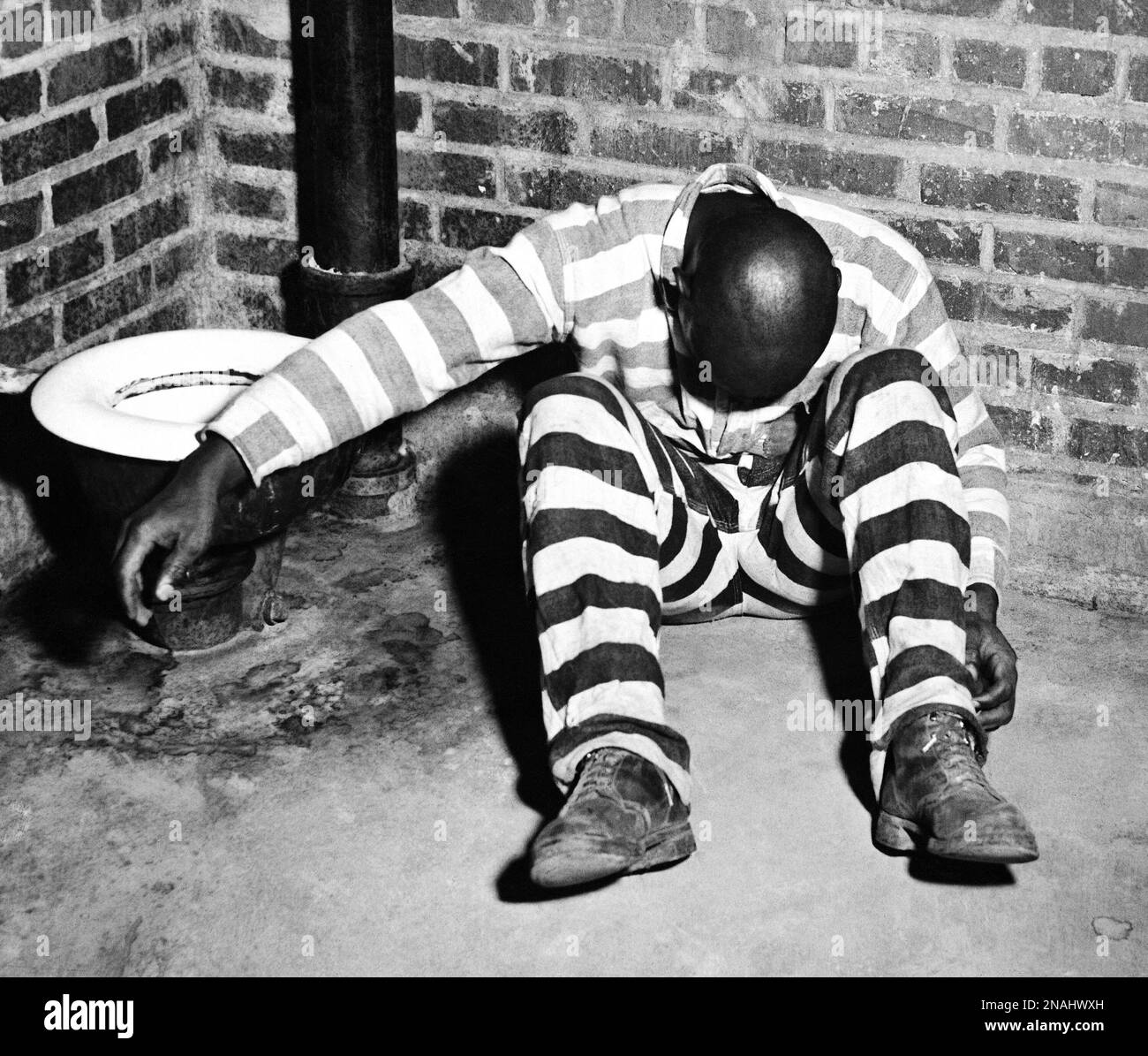 The 8-hours working day has finally come to the chain gangs of the Bibb ...