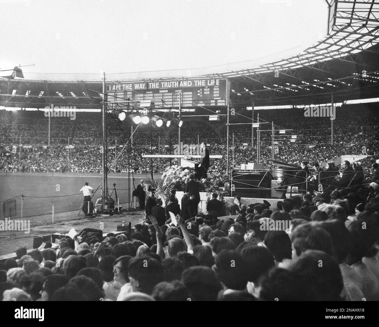 American evangelist Dr. Billy Graham addresses the huge audience in the ...