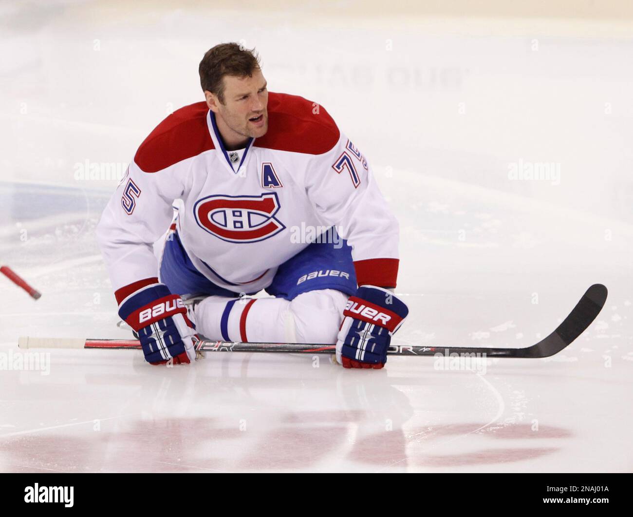 Montreal Canadiens defenseman Hal Gill stretches out before an NHL ...
