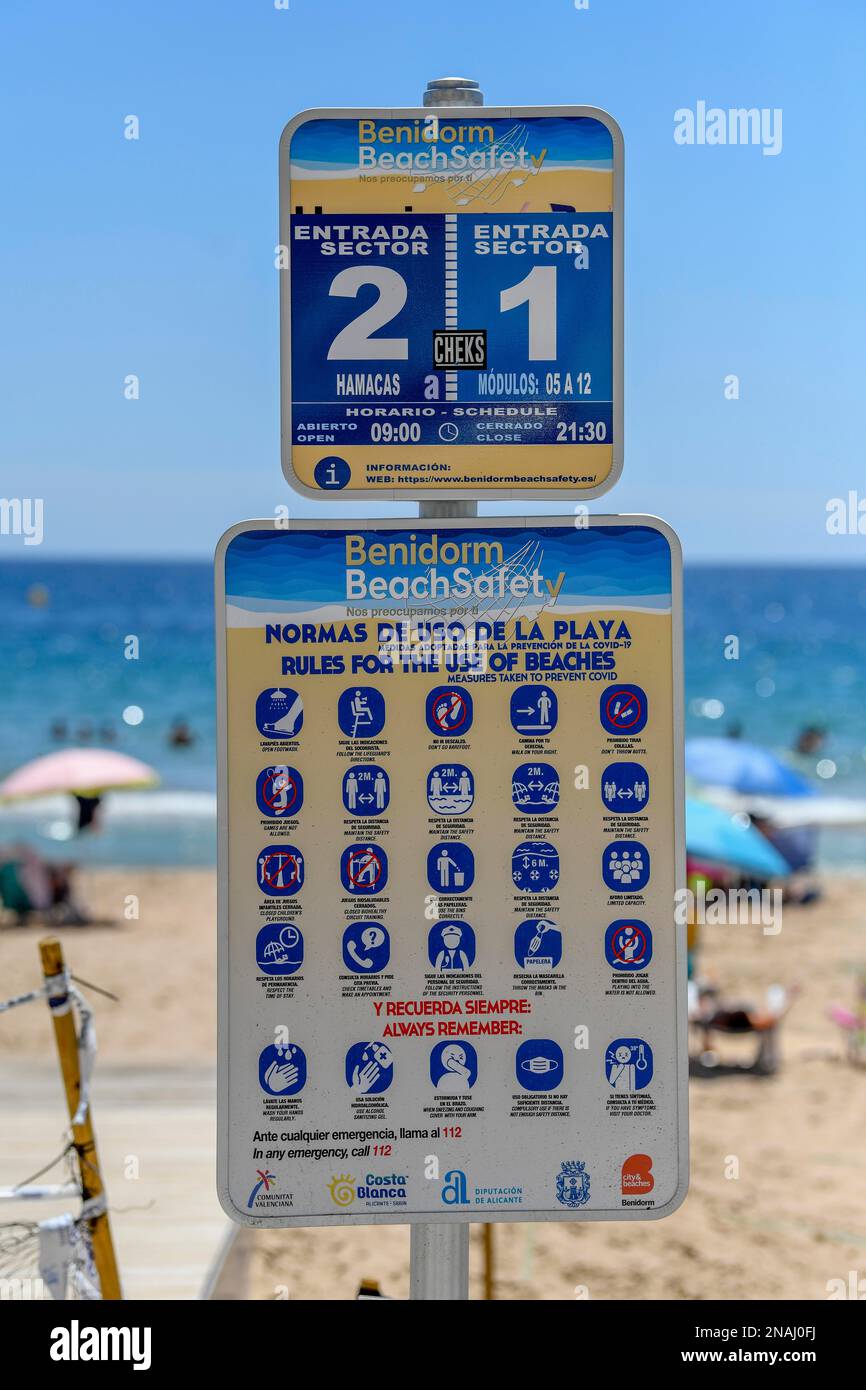 Sign with corona rules on the beach Playa Levante, Benidorm, Alicante ...