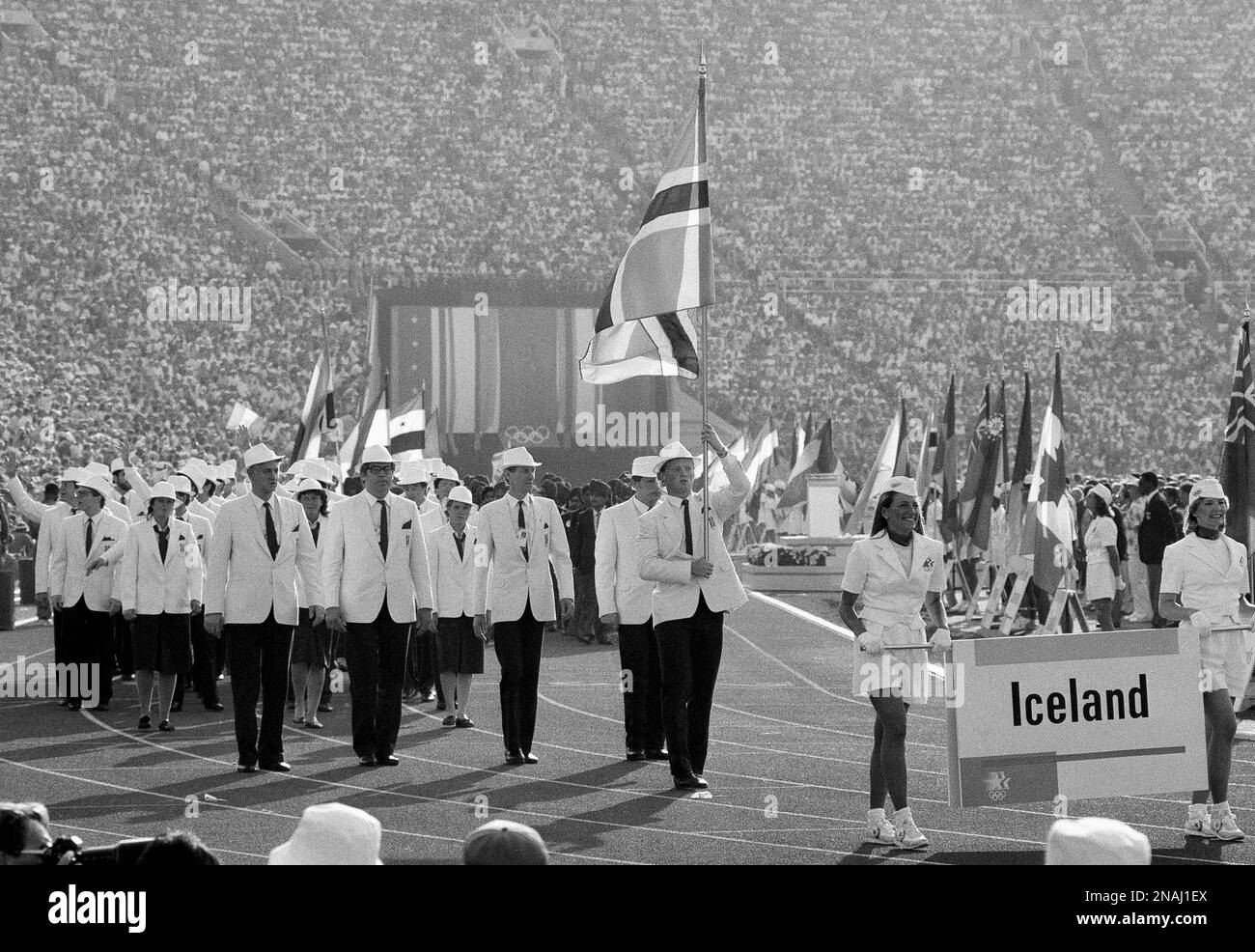 Members of the Iceland Olympic team march in the Parade of the Athletes ...