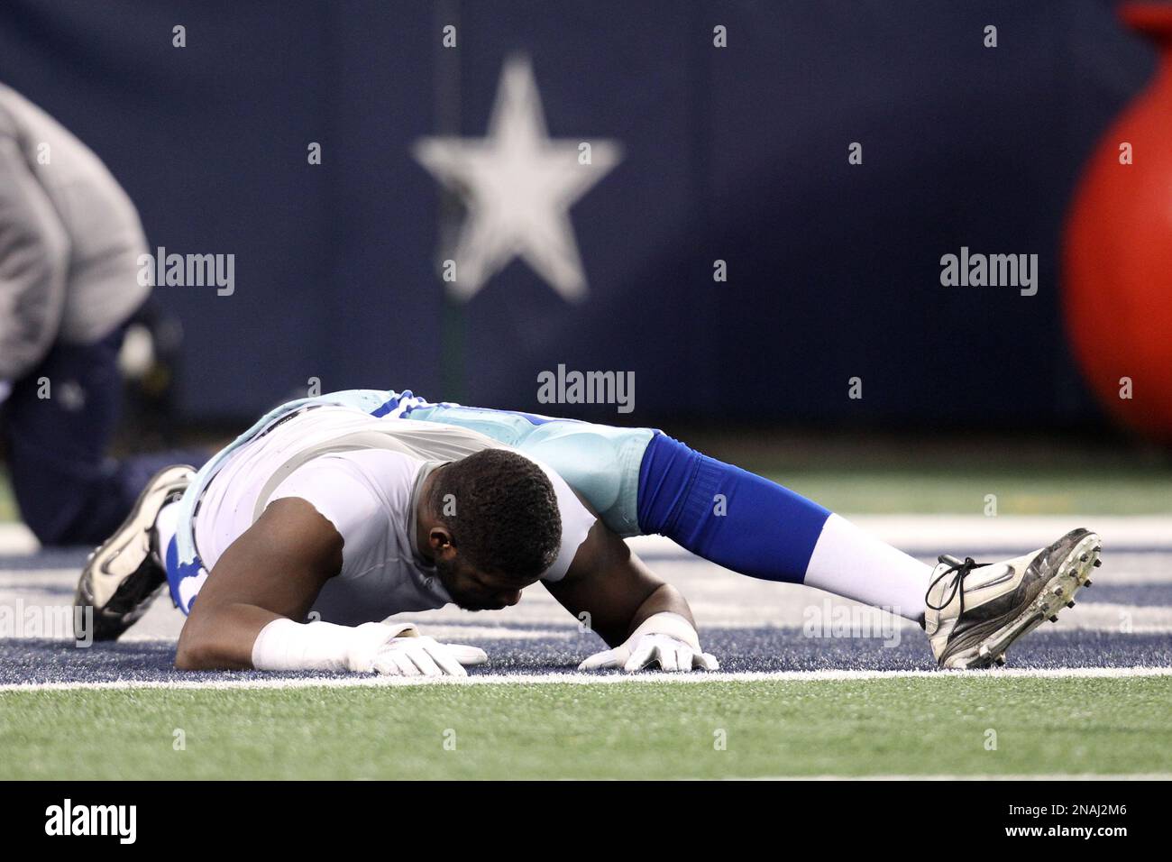 Dallas Cowboys defensive end Clifton Geathers stretches before the an ...