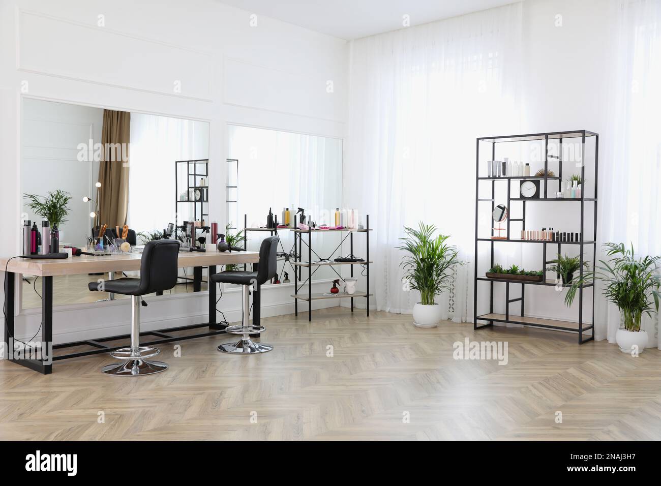 Stylish beauty salon interior with hairdresser's workplace Stock Photo ...