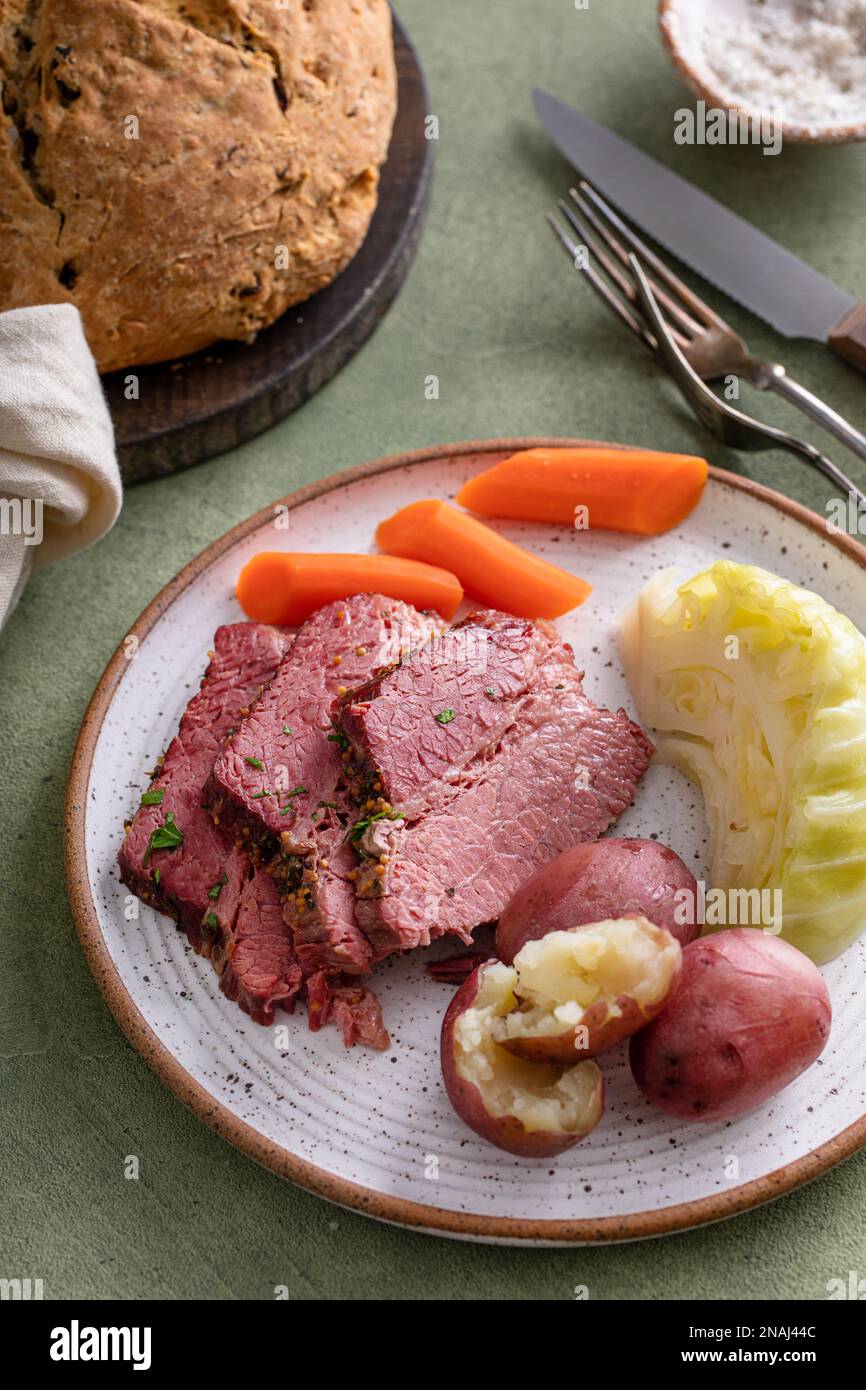 Corned beef with cabbage and potatoes dinner with soda bread, irish ...